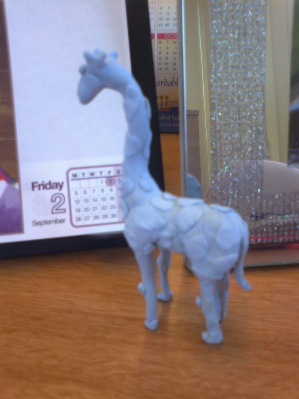 Blue Tack Giraffe · A Recycled Model · Molding on Cut Out + Keep