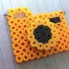 Hama Beads Camera · How To Make A Pegboard Bead Pendant · Art, Beadwork ...